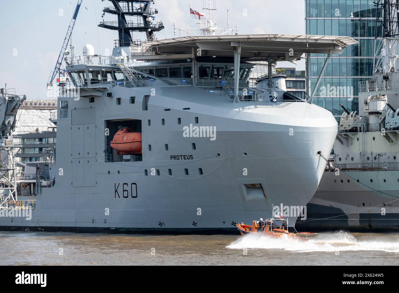 London, UK. 12 May 2024. RFA Proteus is seen moored next to HMS Belfast ...