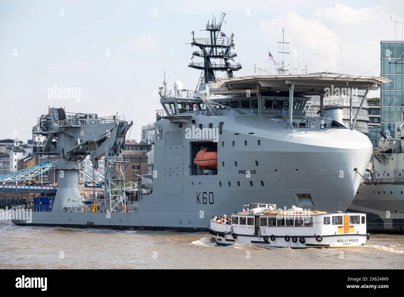 London, UK. 12 May 2024. RFA Proteus is seen moored next to HMS Belfast ...