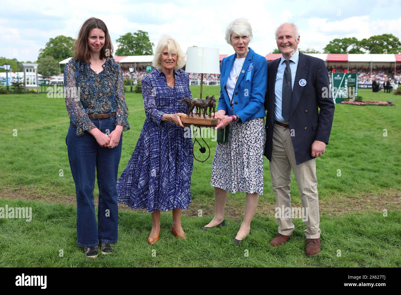 Queen Camilla presents Jane Tuckwell, Event Director of Badminton ...