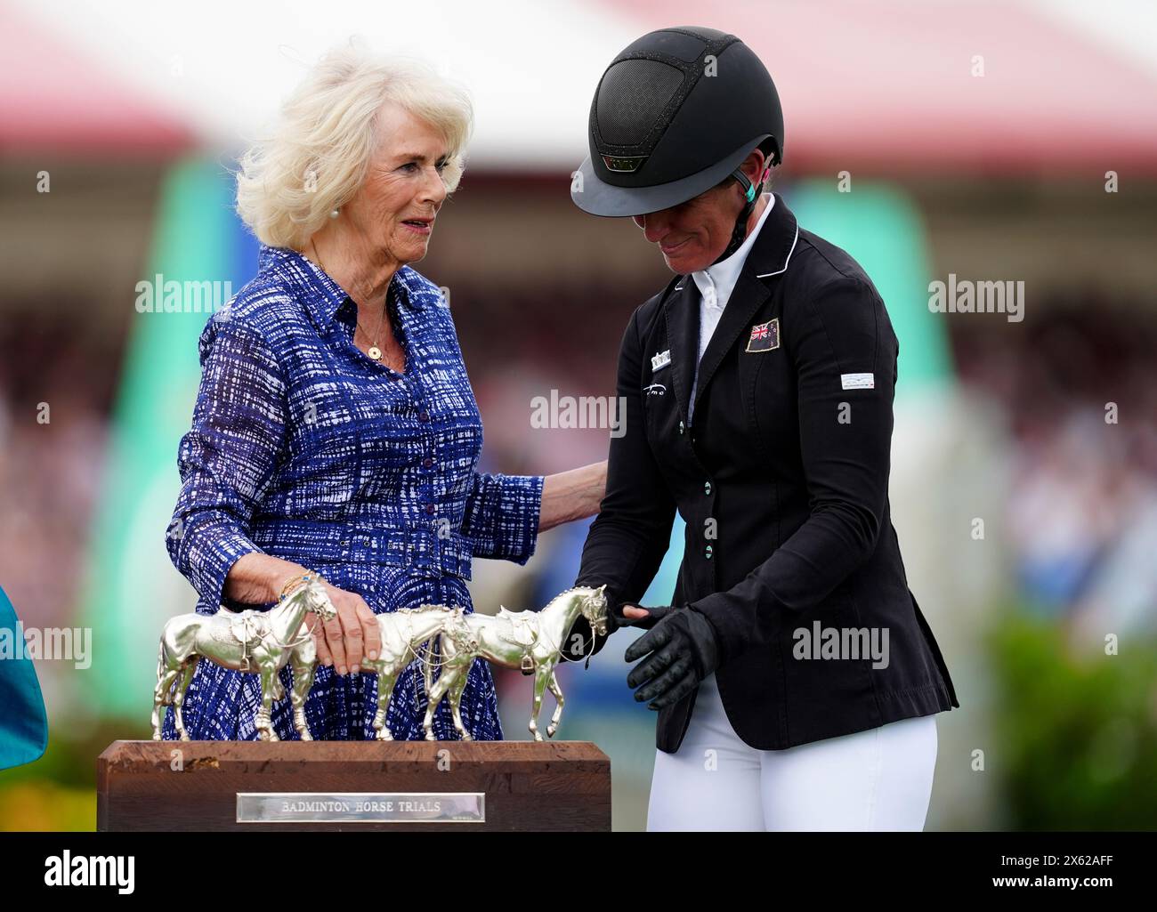 Queen Camilla presents first placed Caroline Powell from New Zealand ...