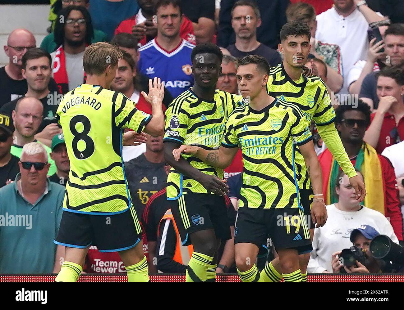 Arsenal's Leandro Trossard (second right) celebrates scoring their side ...