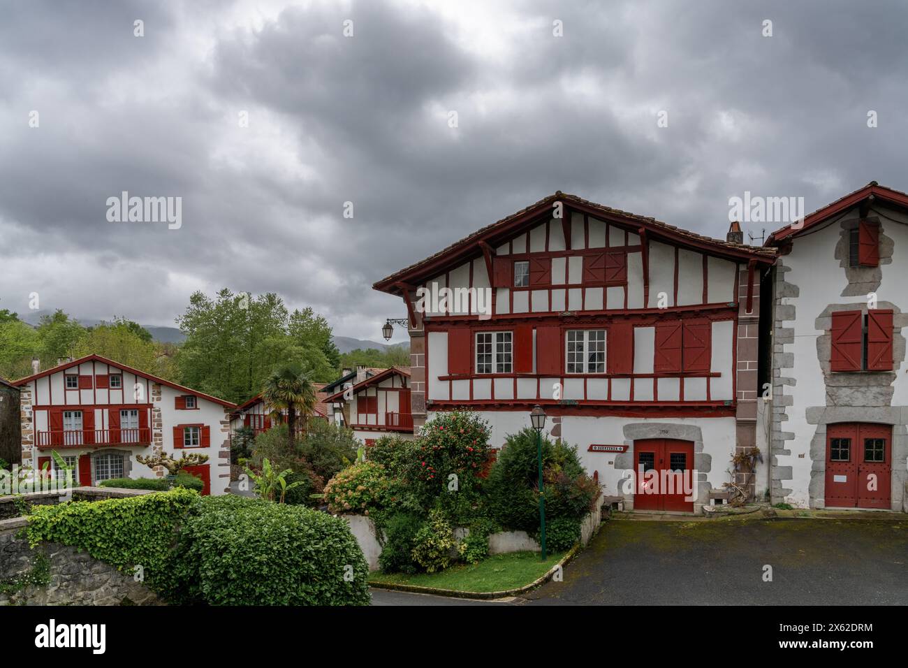Ainhoa. France - 16 April, 2024: typical colourful Basque houses in the ...