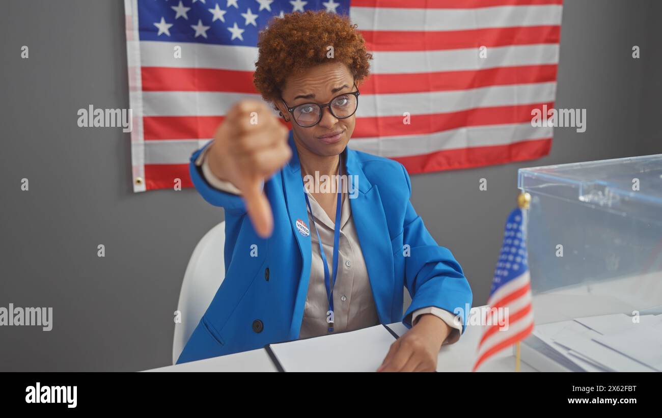 African american woman giving thumbs down in a voting center with us ...