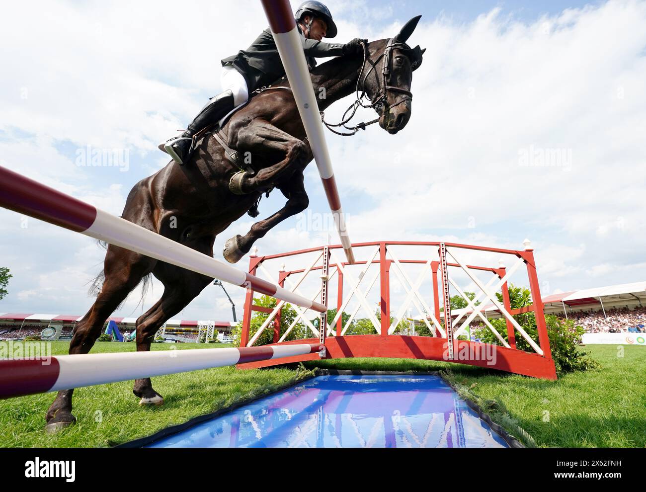 Over night leader Tim Price on Vitali knocks a pole off at the water ...
