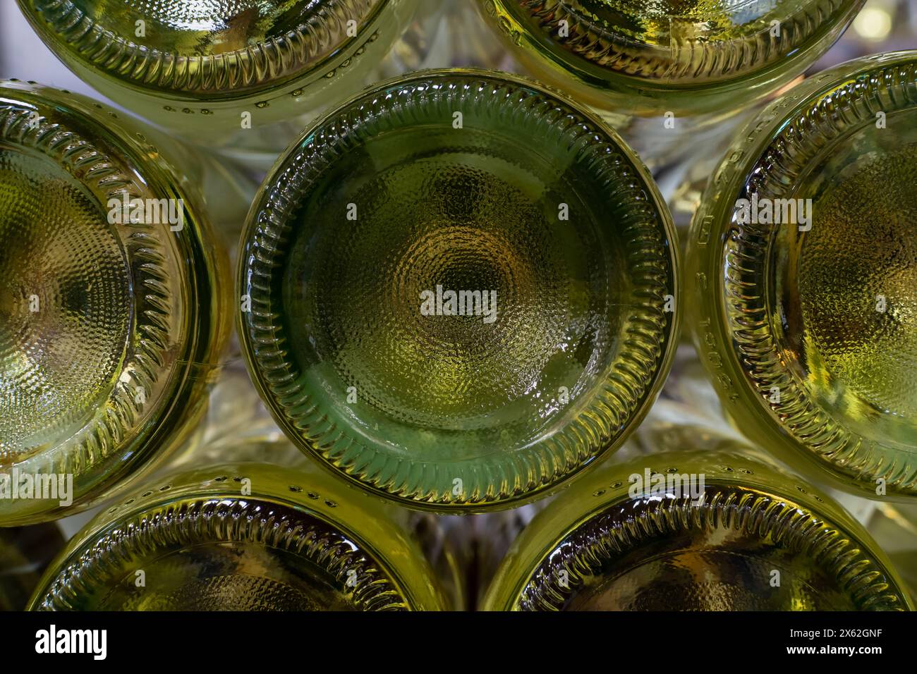 Bottom of white wine bottles in horizontal position close-up Stock ...