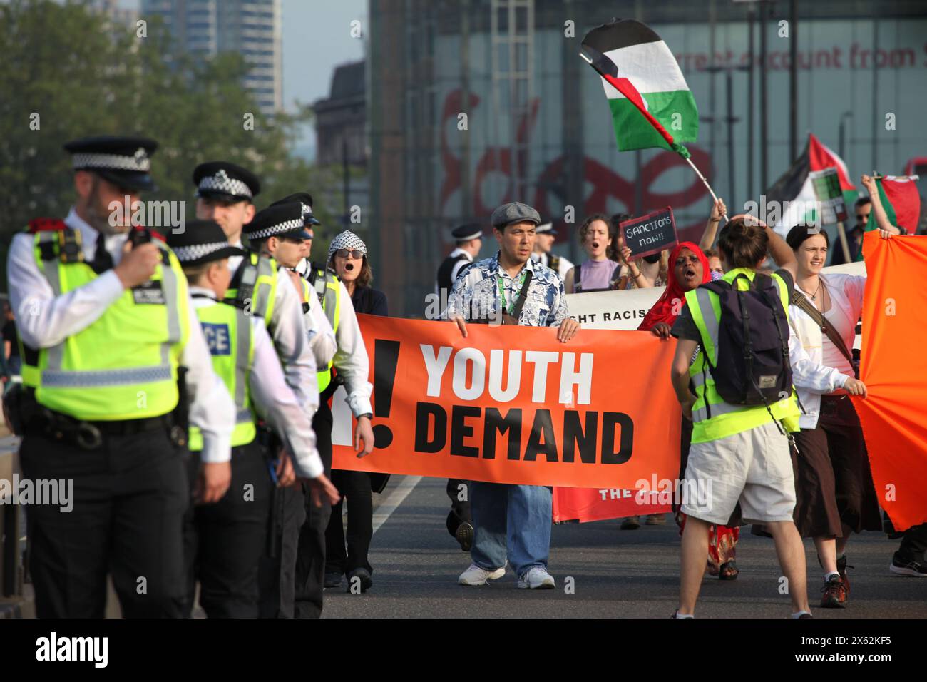 London, UK. 11th May, 2024. Protesters march along Waterloo Bridge ...