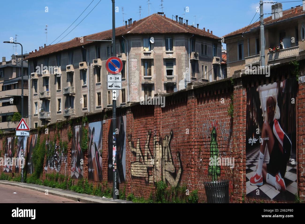 Wall separating Via Tortona from the railway line, Milan Stock Photo ...