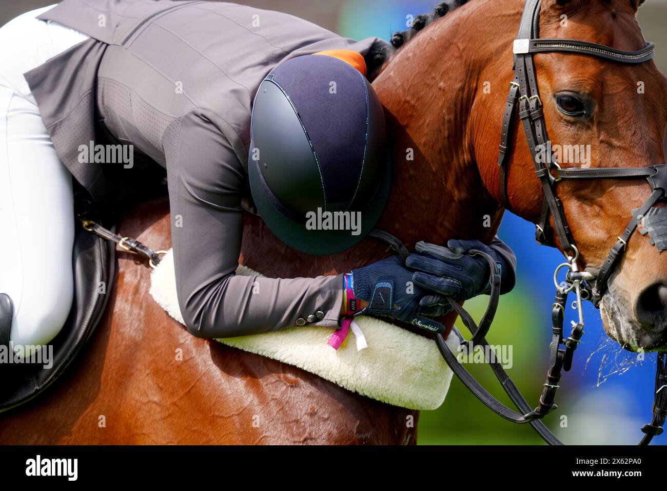 Bubby Upton hugs Cola after her showjumping round on day five of the ...
