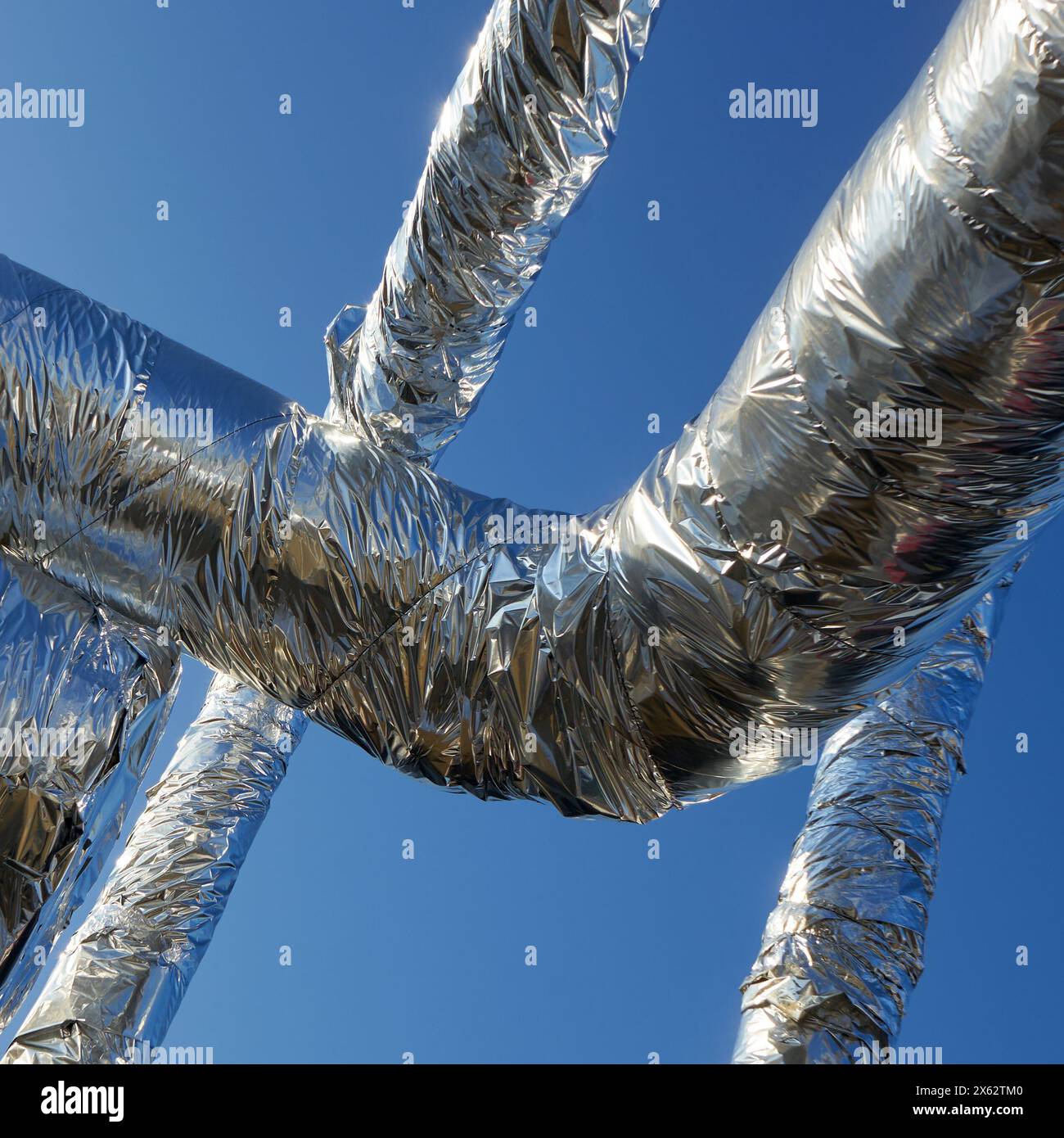 Isolated pipes with aluminum foil to maintain the heat of the water ...