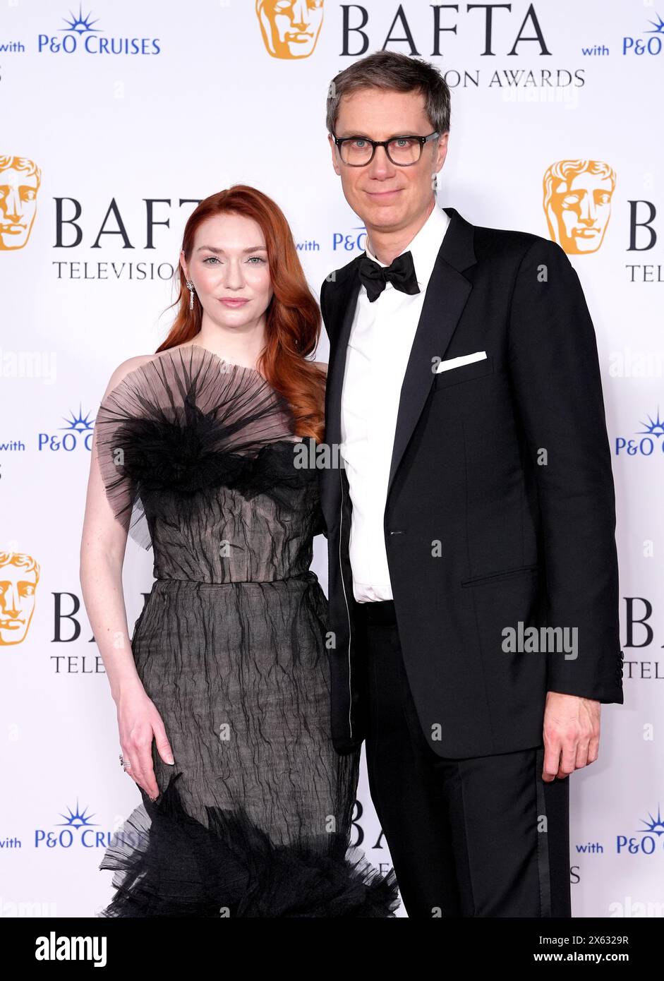 Eleanor Tomlinson and Stephen Merchant in the press room at the BAFTA ...