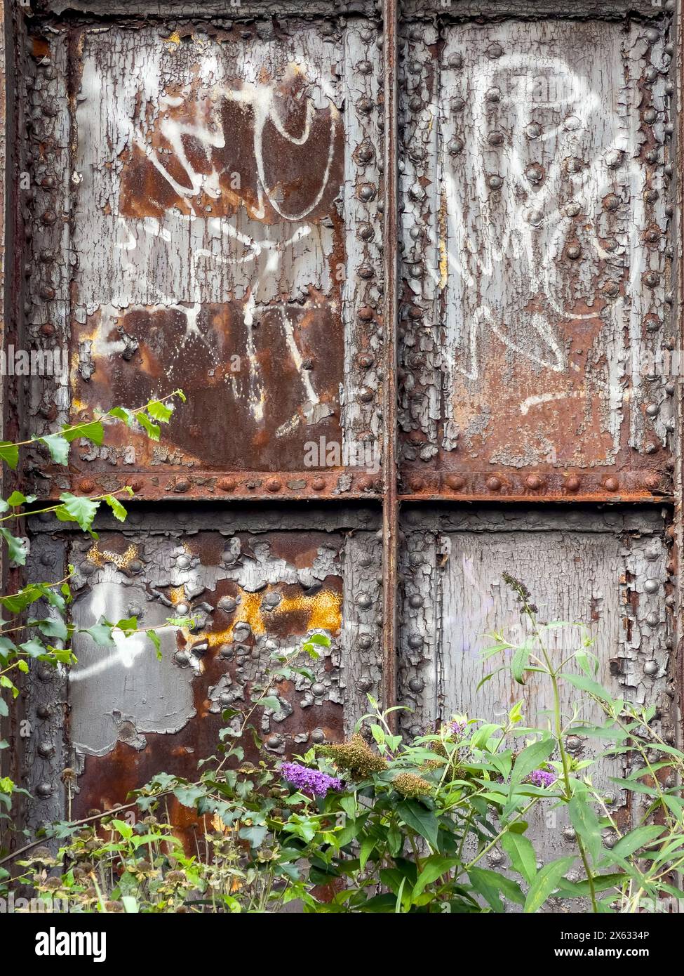 Close-up of the painted steel panels of the disused Castlefield Viaduct ...