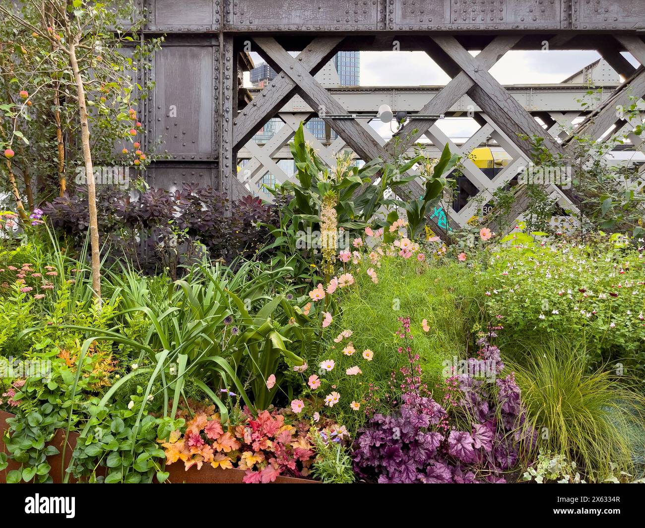 Raised flower bed made from weathered steel at Castlefield Viaduct Sky ...