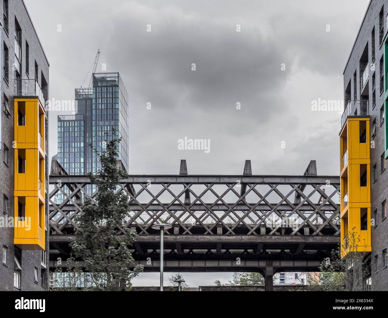 Castlefield Viaduct framed by Potato Wharf canal side development with ...