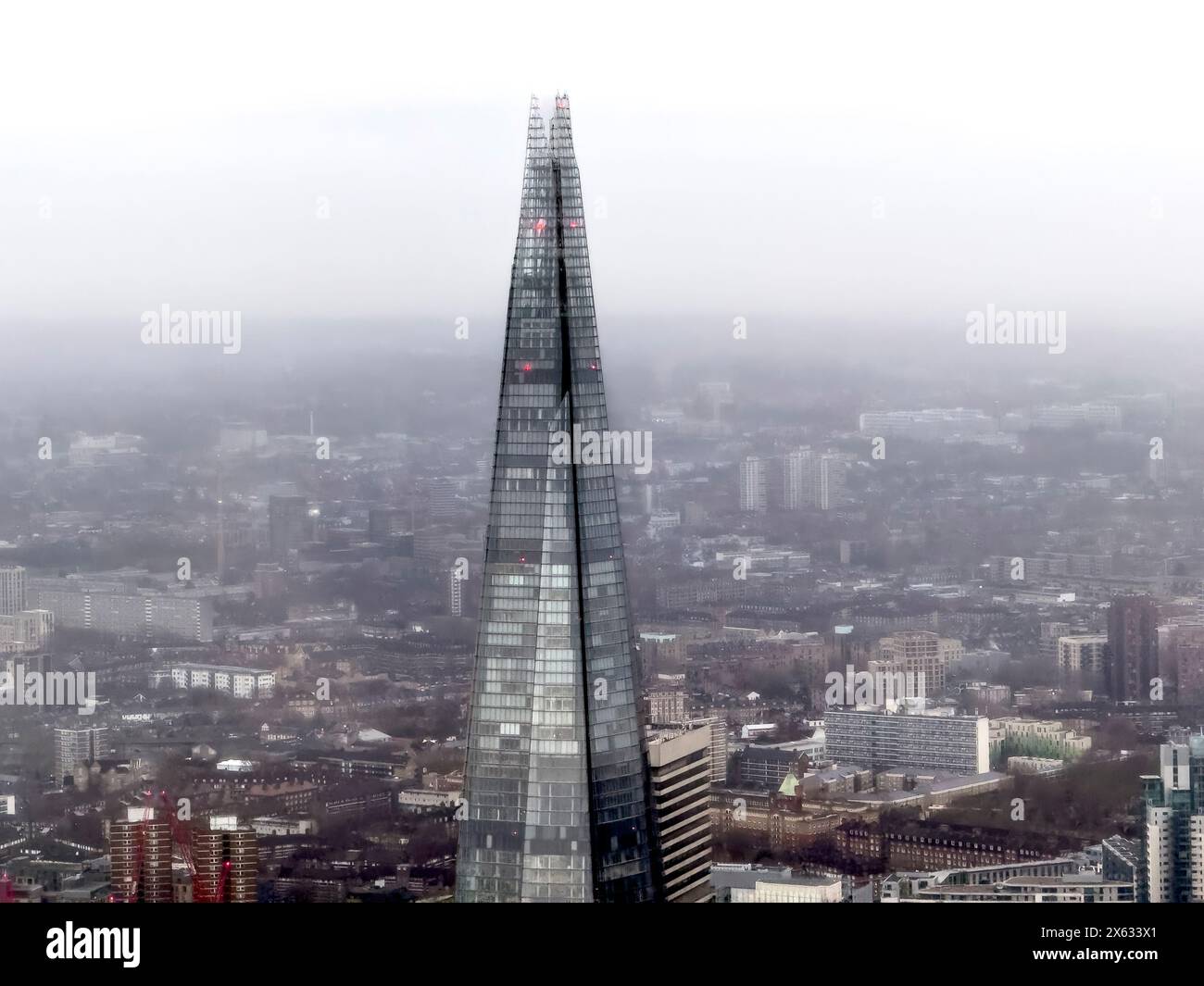 Elevated view from the Horizon 22 Building of The Shard's spire on a ...