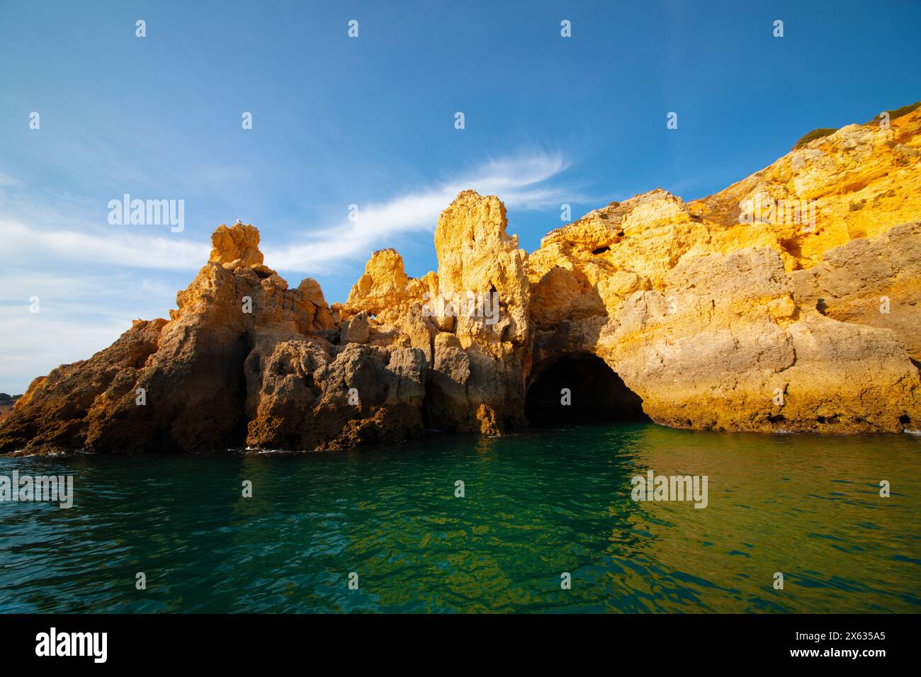 stunningly beautiful rocks in ocean near coast of Algarve in Portugal ...