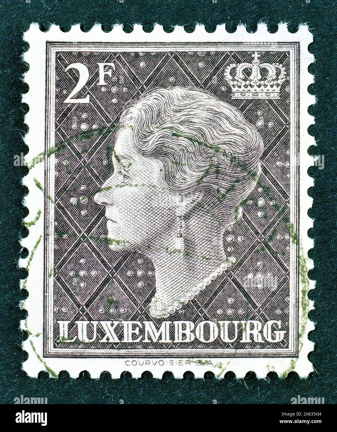 Postage stamp printed by Luxembourg, that shows portrait of Charlotte, circa 1948 Stock Photo ...