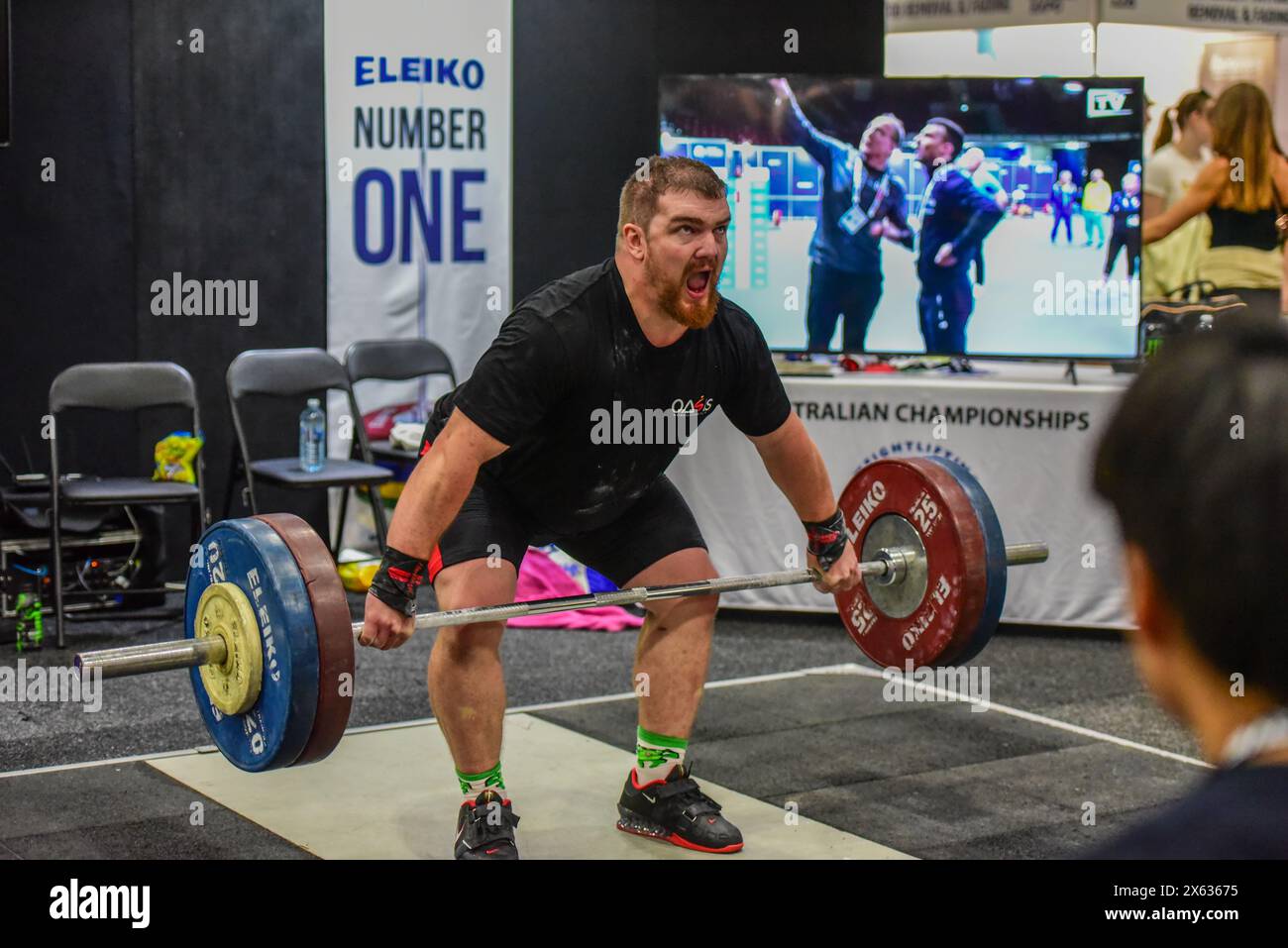 Australian weightlifter William Brown is seen in action at the ...