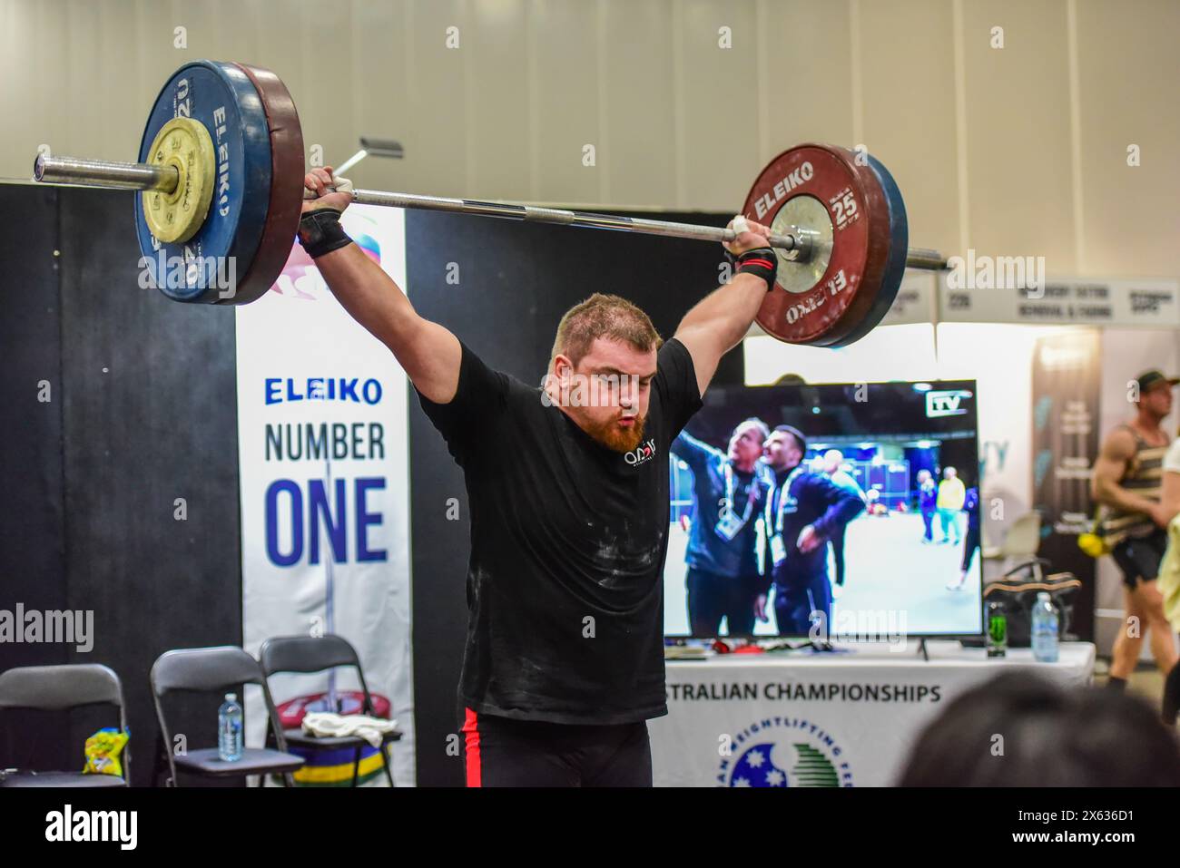 Australian weightlifter William Brown is seen in action at the ...