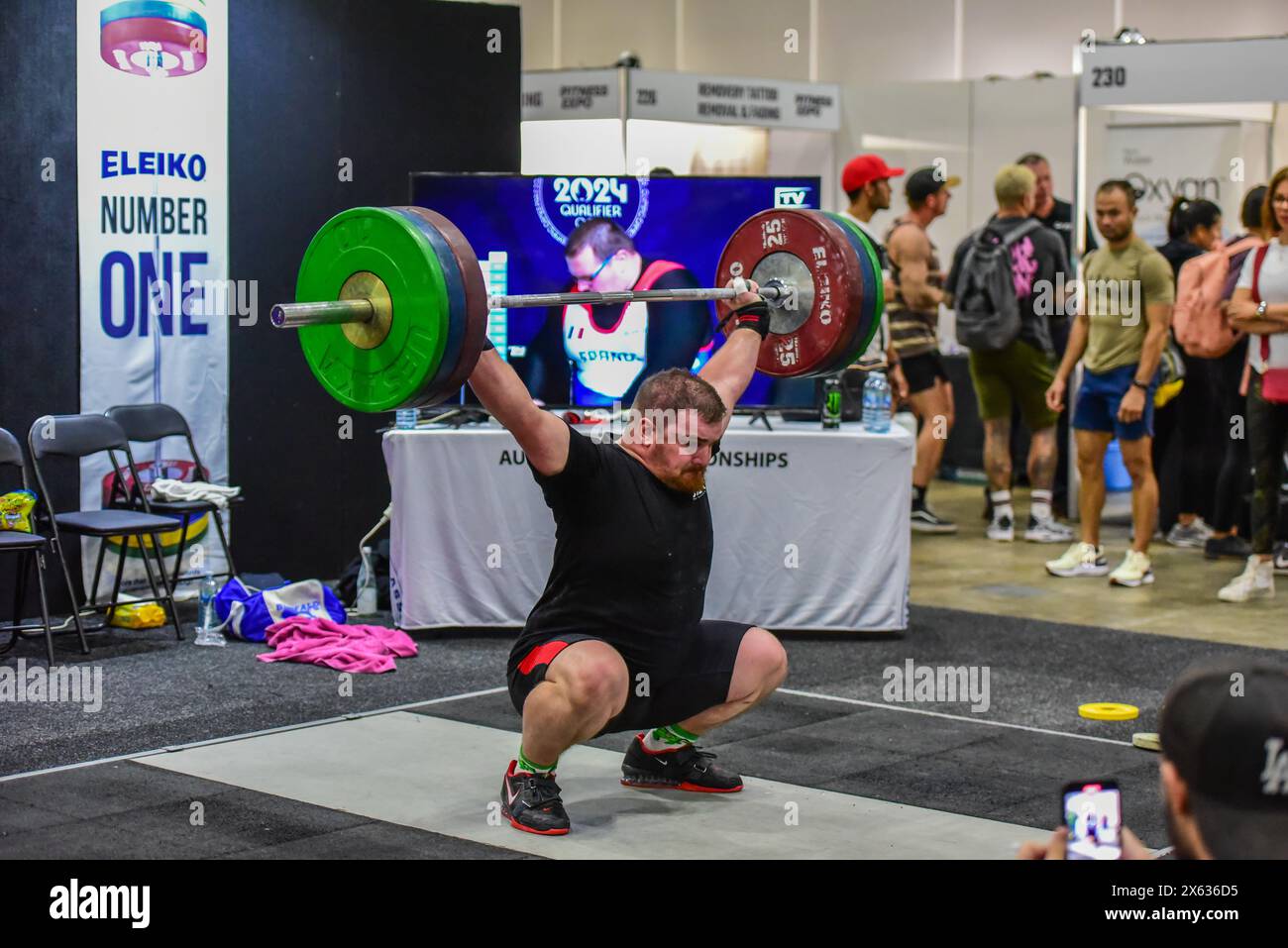 Australian weightlifter William Brown is seen in action at the ...