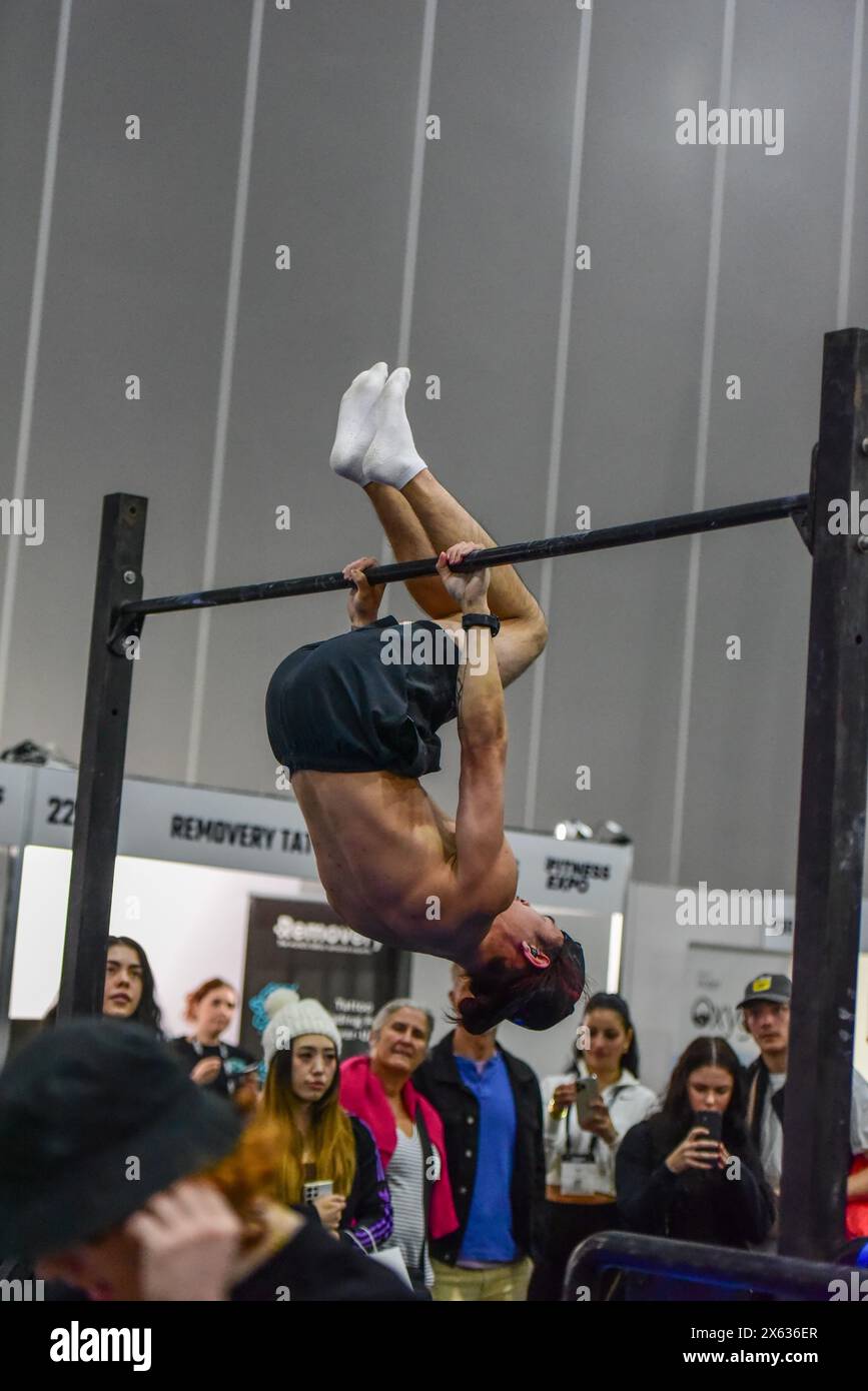 A competitor competes in Streetlifting Calisthenics Competition at the ...
