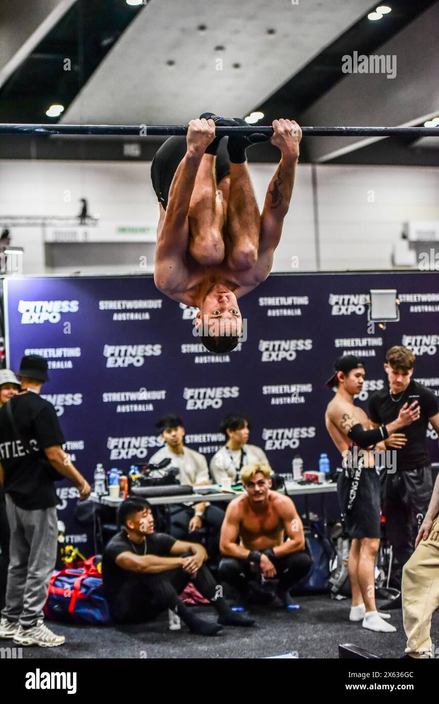 A competitor competes in Streetlifting Calisthenics Competition at the ...