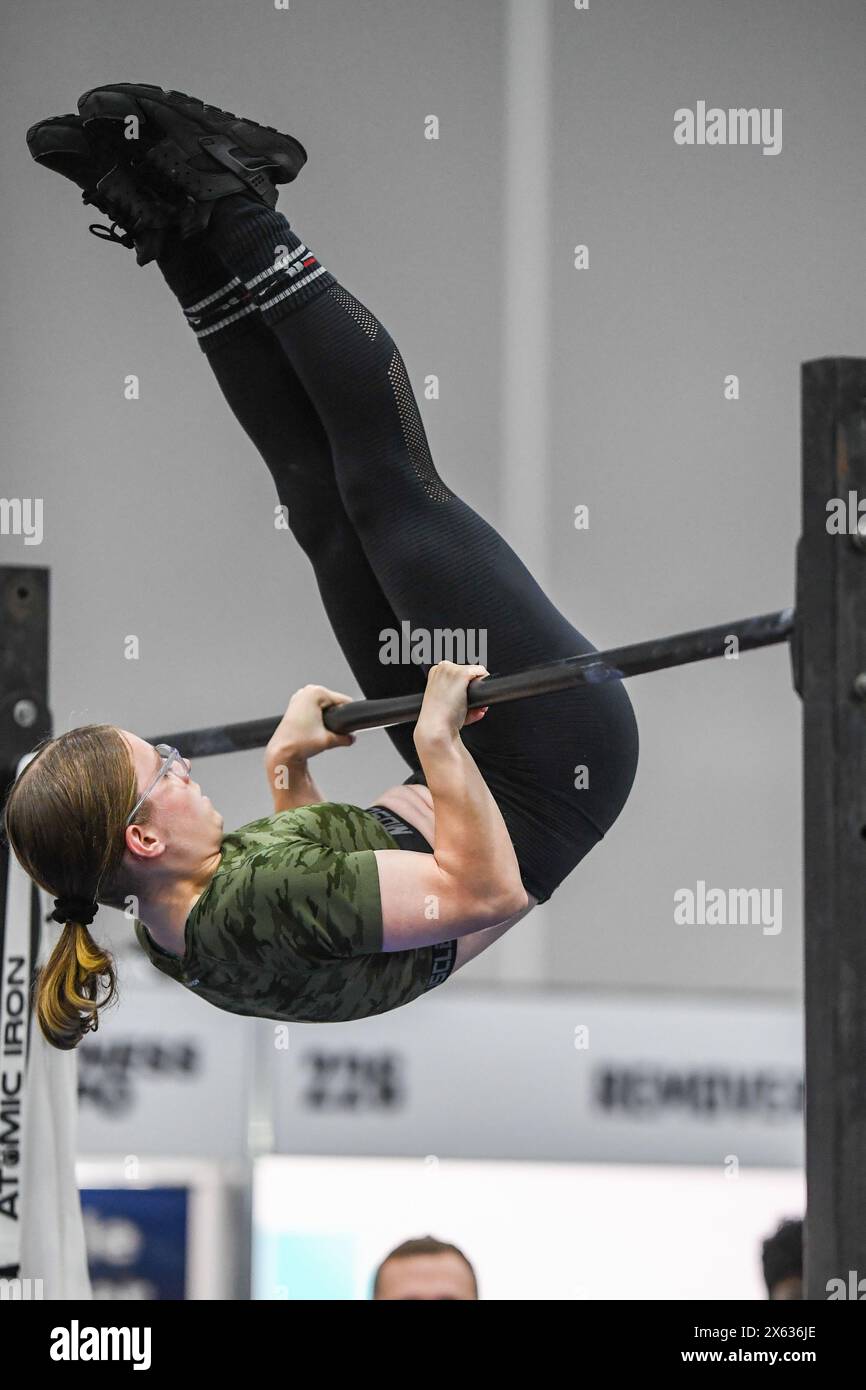 A female competitor competes in Streetlifting Calisthenics Competition ...