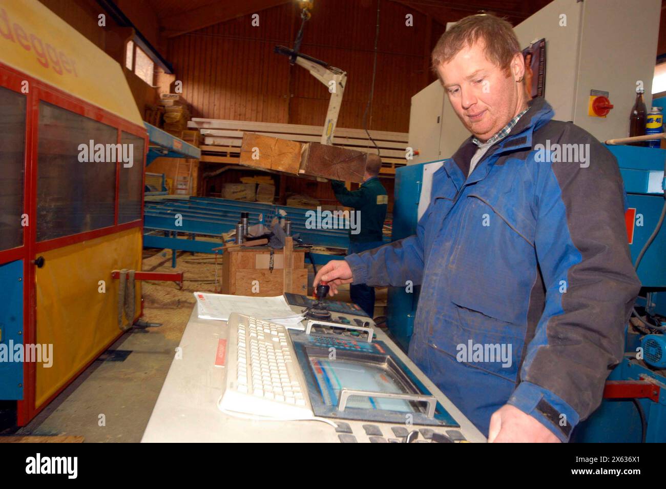 carpenter a craftsman who works with wood and processes it working in a ...