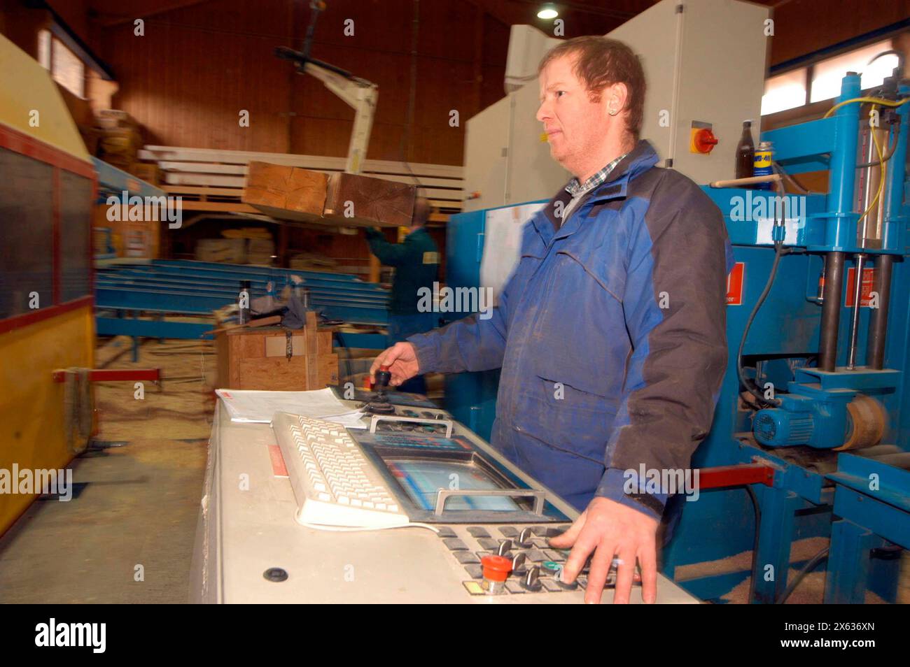 carpenter a craftsman who works with wood and processes it working in a ...