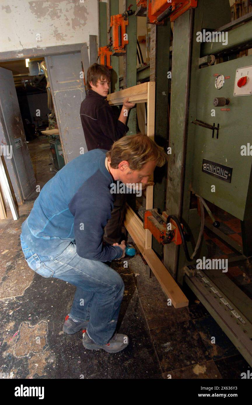 carpenter a craftsman who works with wood and processes it working in a ...