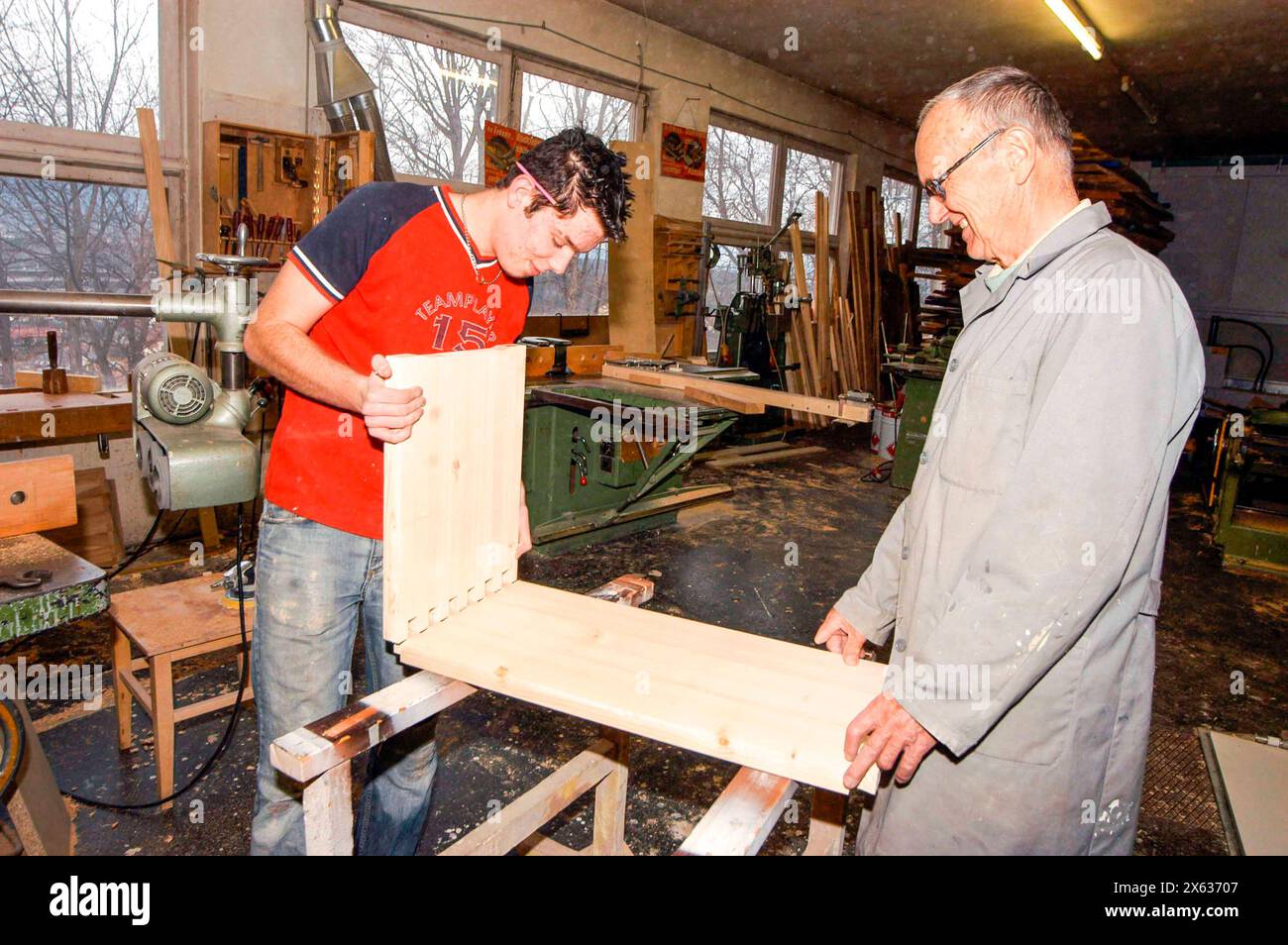 carpenter a craftsman who works with wood and processes it working in a ...