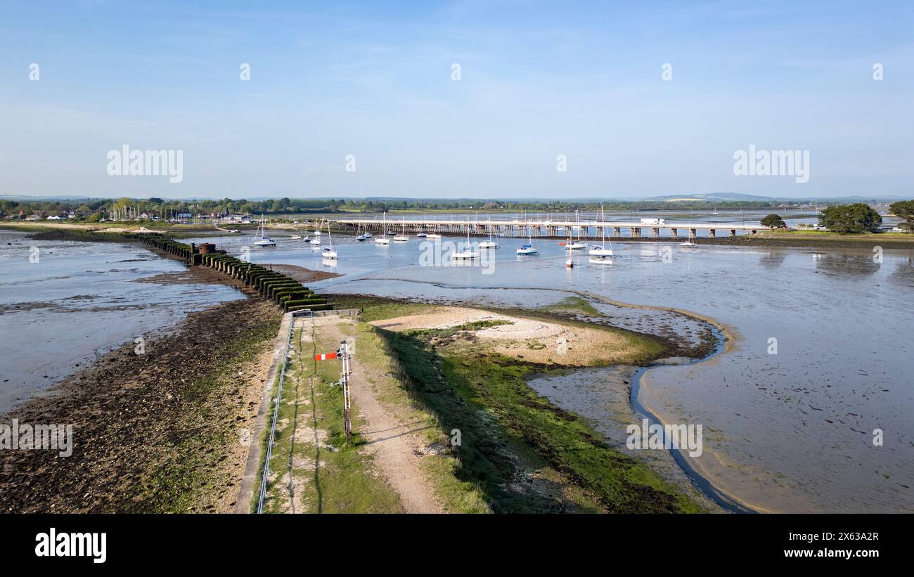 Remains of old railway bridge between Langstone (top of picture) and ...
