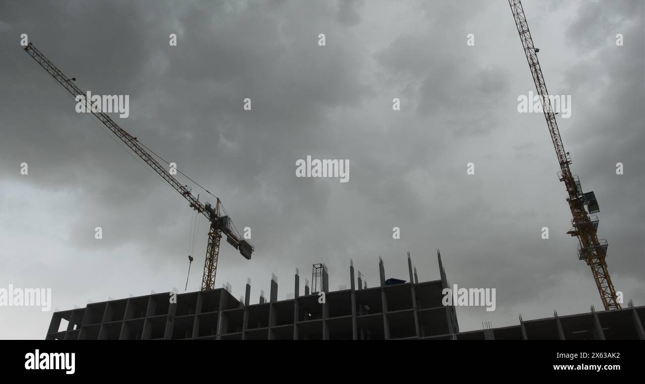 The building cranes rotates from the wind. Strong wind. Crane on ...