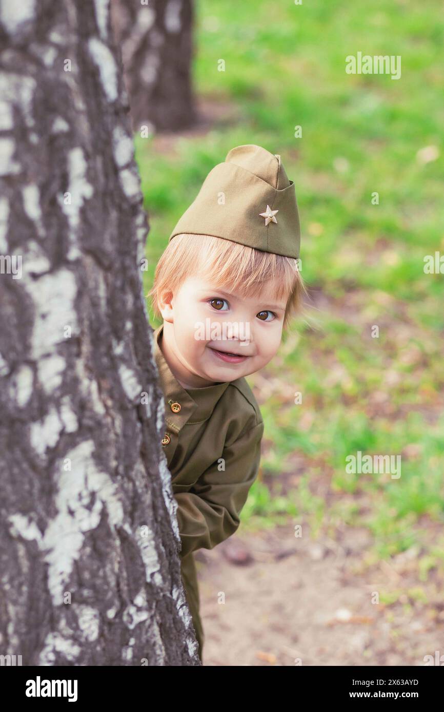 Adorable baby girl in Soviet military uniform Stock Photo - Alamy