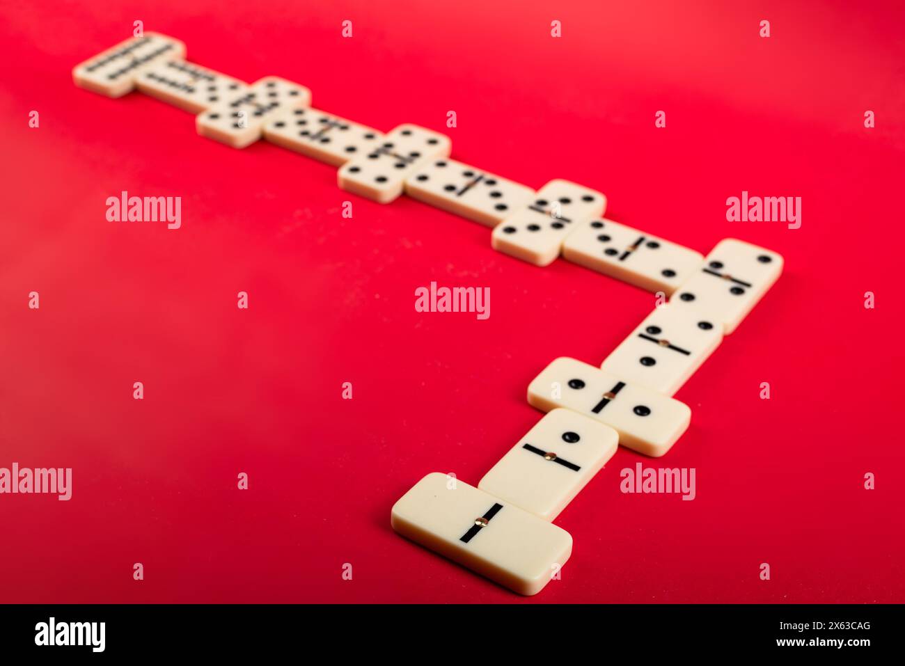 Dominoes with red background, copy space and various angles, board ...