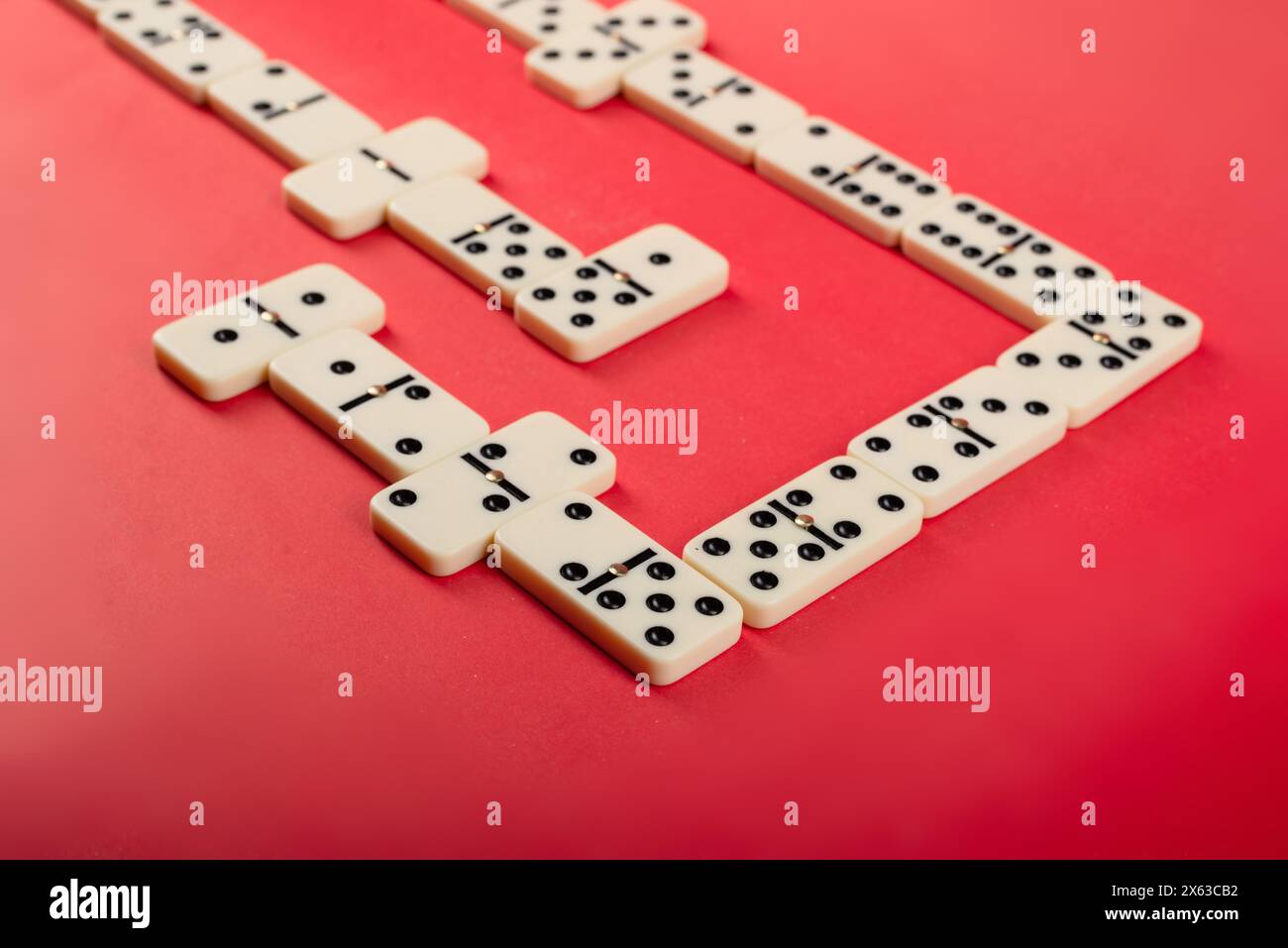 Dominoes with red background, copy space and various angles, board ...