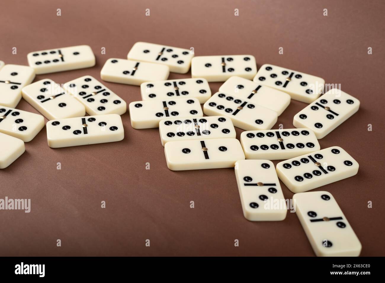 Dominoes with brown background, copy space and various angles, board ...