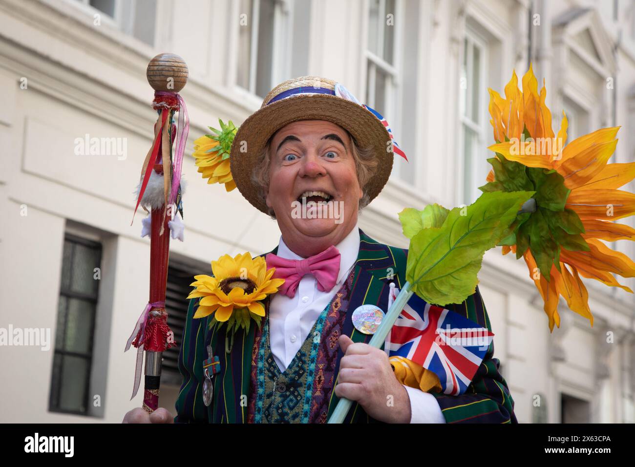 London, UK. 12th May 2024.Stilt performer Professor Crump aka Paul ...