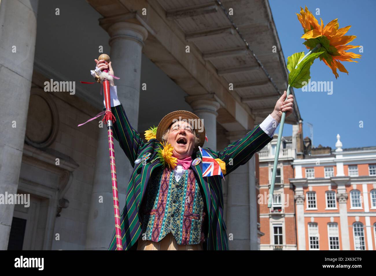London, UK. 12th May 2024.Stilt performer Professor Crump aka Paul ...