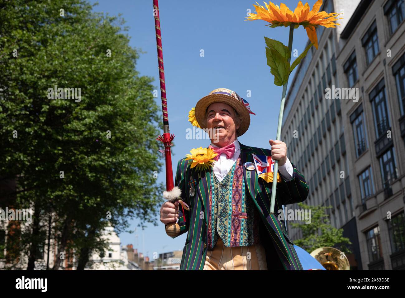 London, UK. 12th May 2024.Stilt performer Professor Crump aka Paul ...