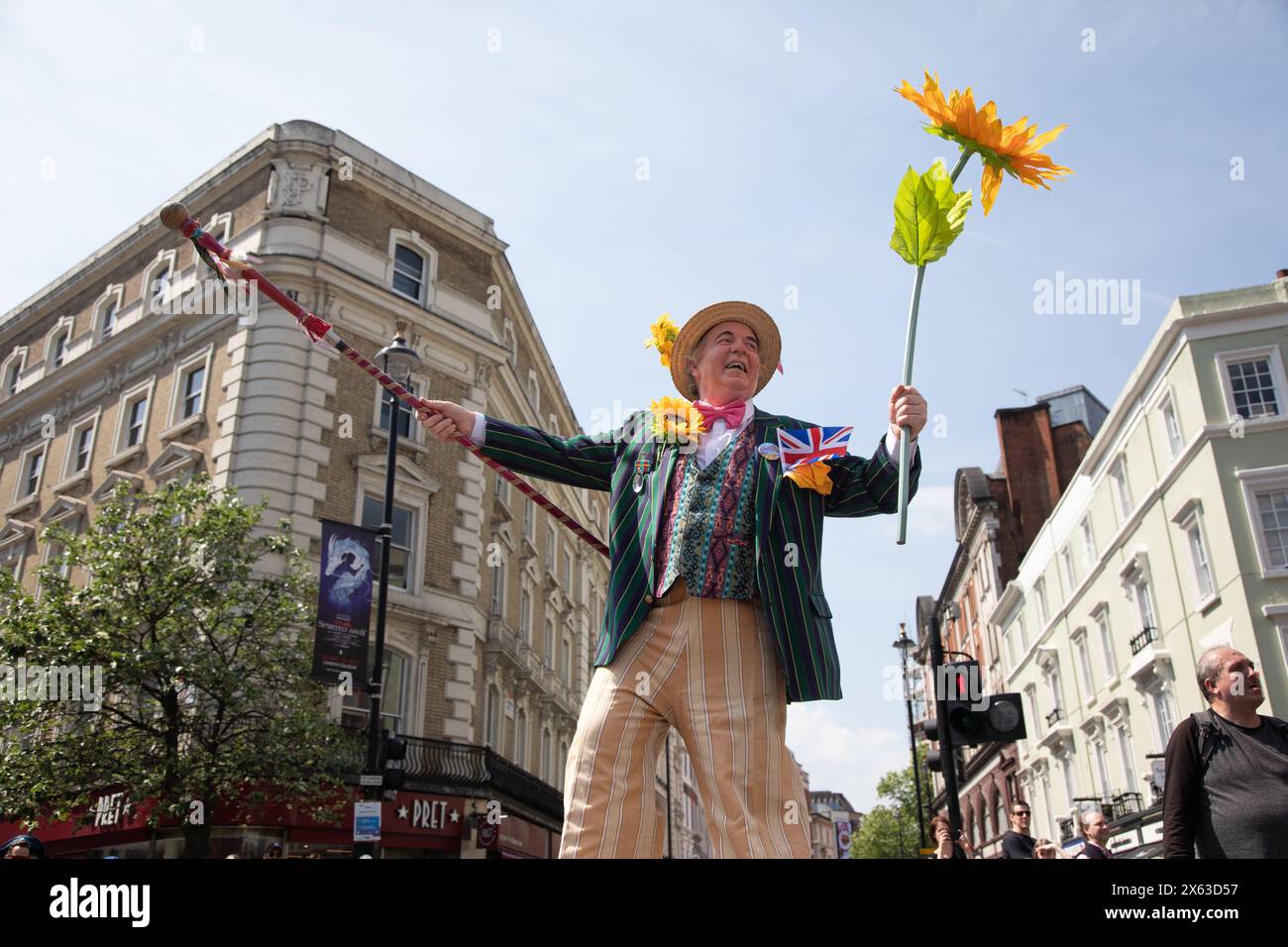 London, UK. 12th May 2024.Stilt performer Professor Crump aka Paul ...