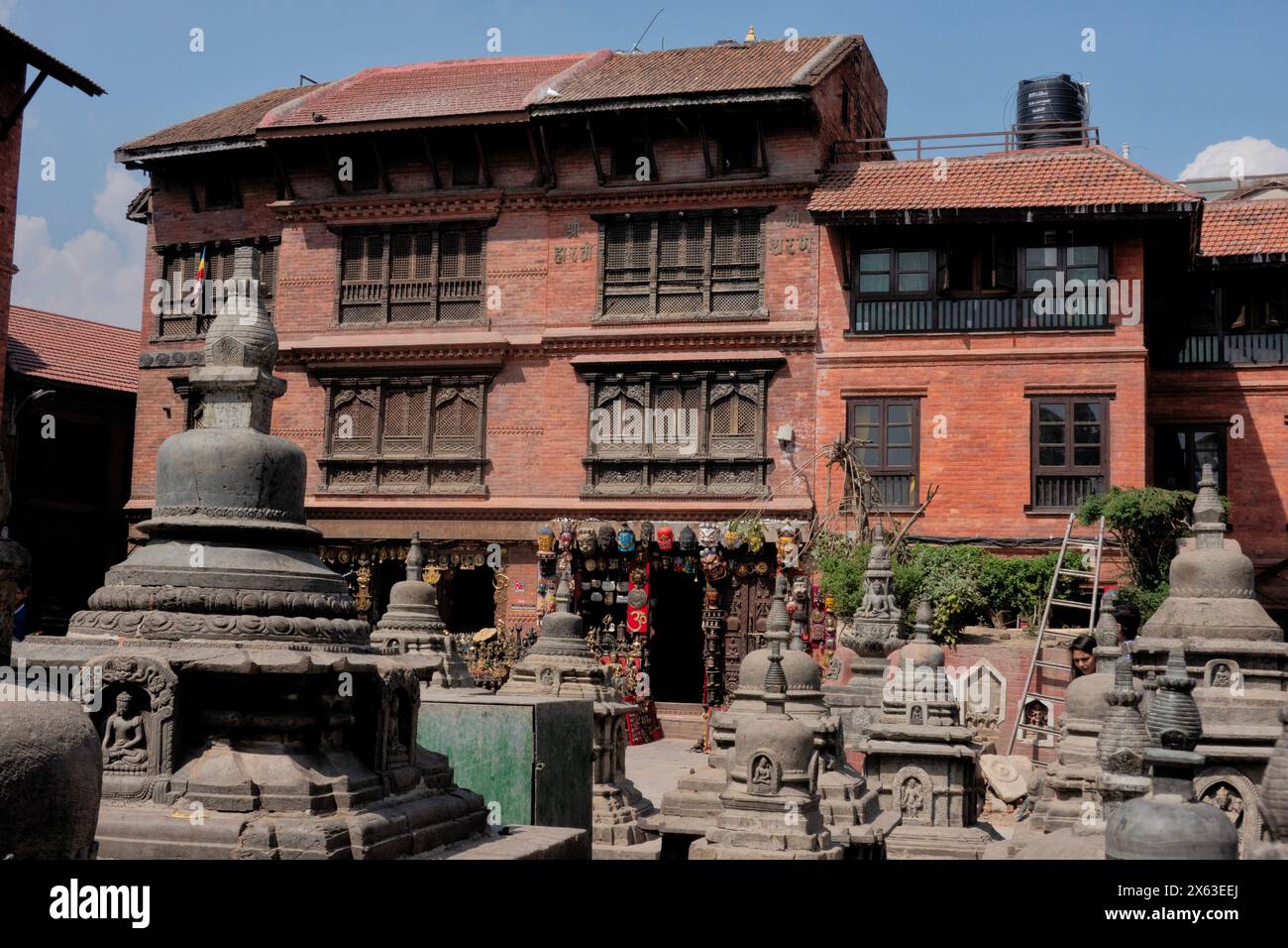 Traditional Newari architecture and souvenir shop at Swayambunath ...