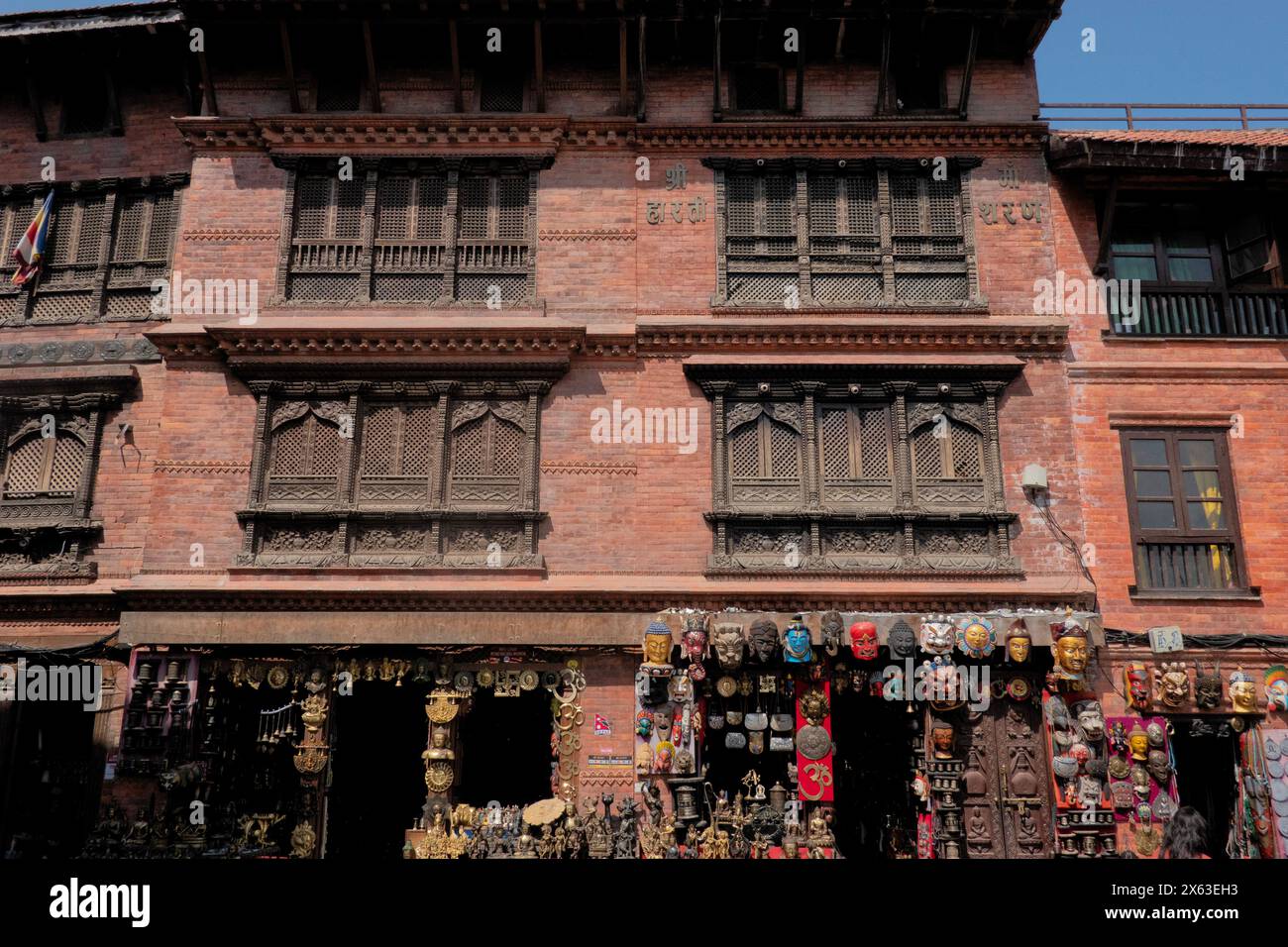 Traditional Newari architecture and souvenir shop at Swayambunath ...