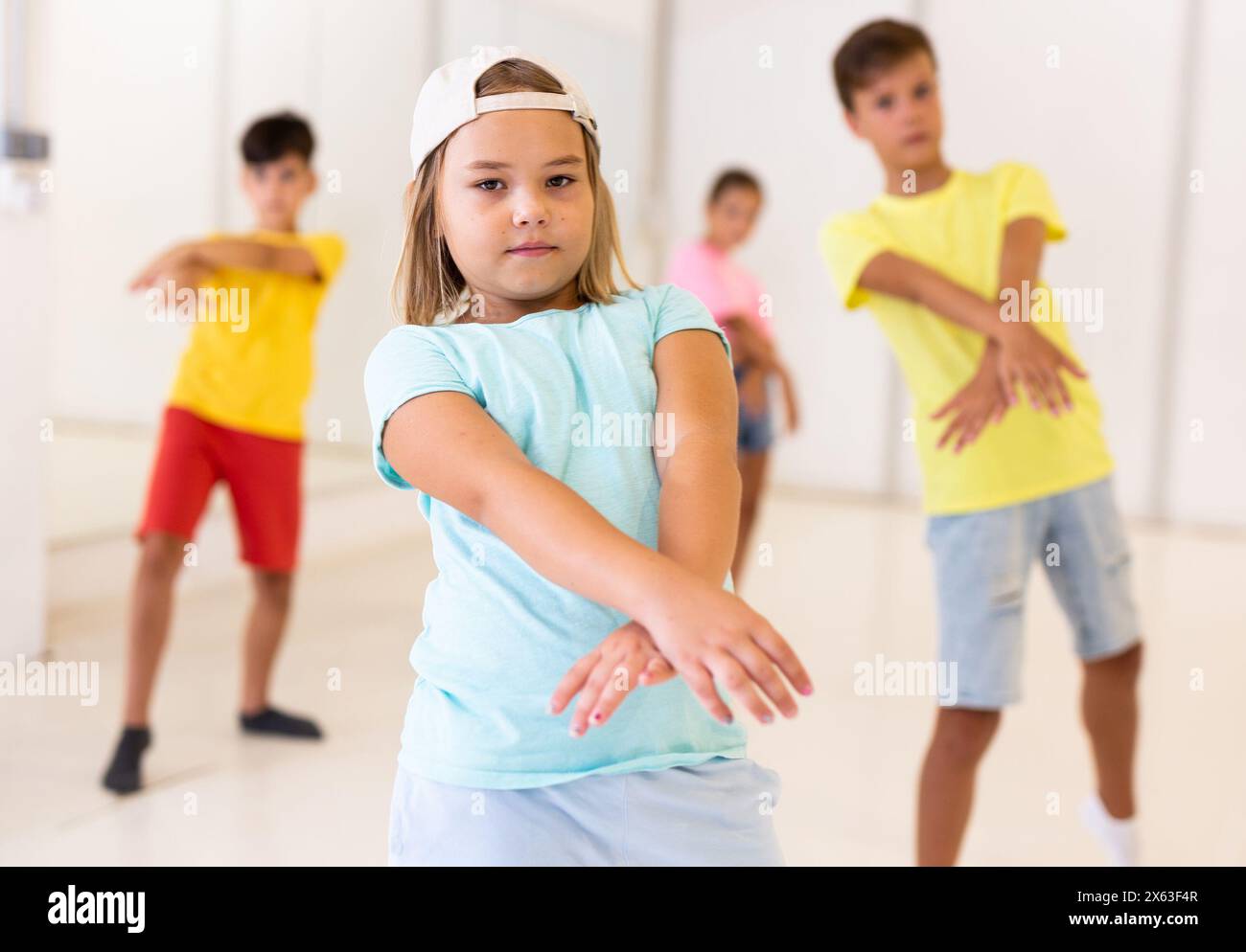 Group of kids performing hip-hop dance Stock Photo - Alamy