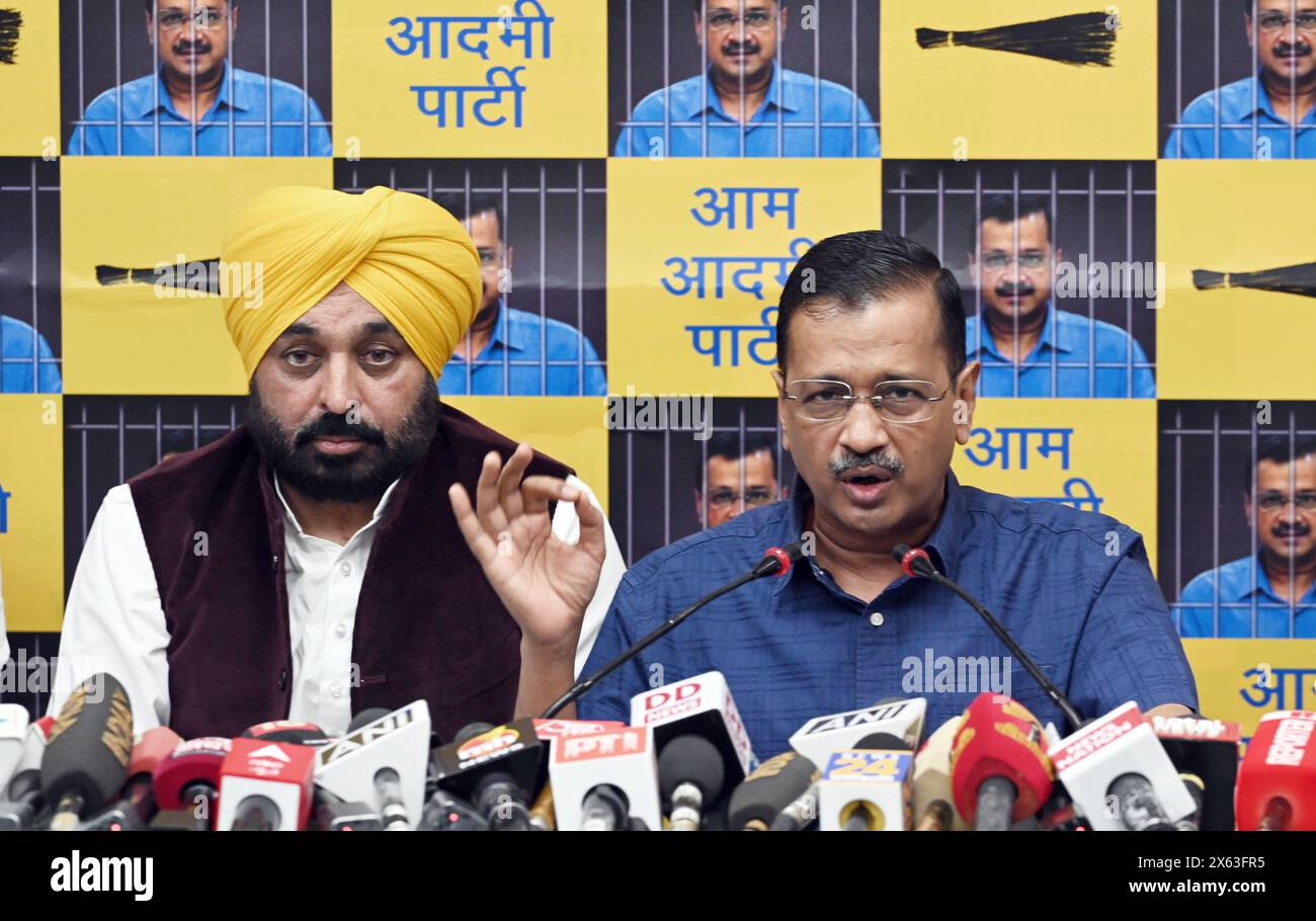 NEW DELHI, INDIA - MAY 12: Delhi CM Arvind Kejriwal with Punjab CM Bhagwant Mann, and other ...