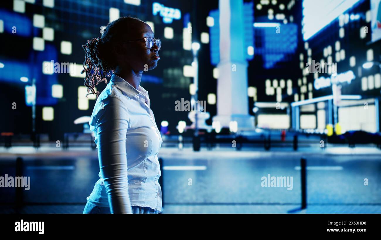 African american woman wandering around city avenues during nighttime ...