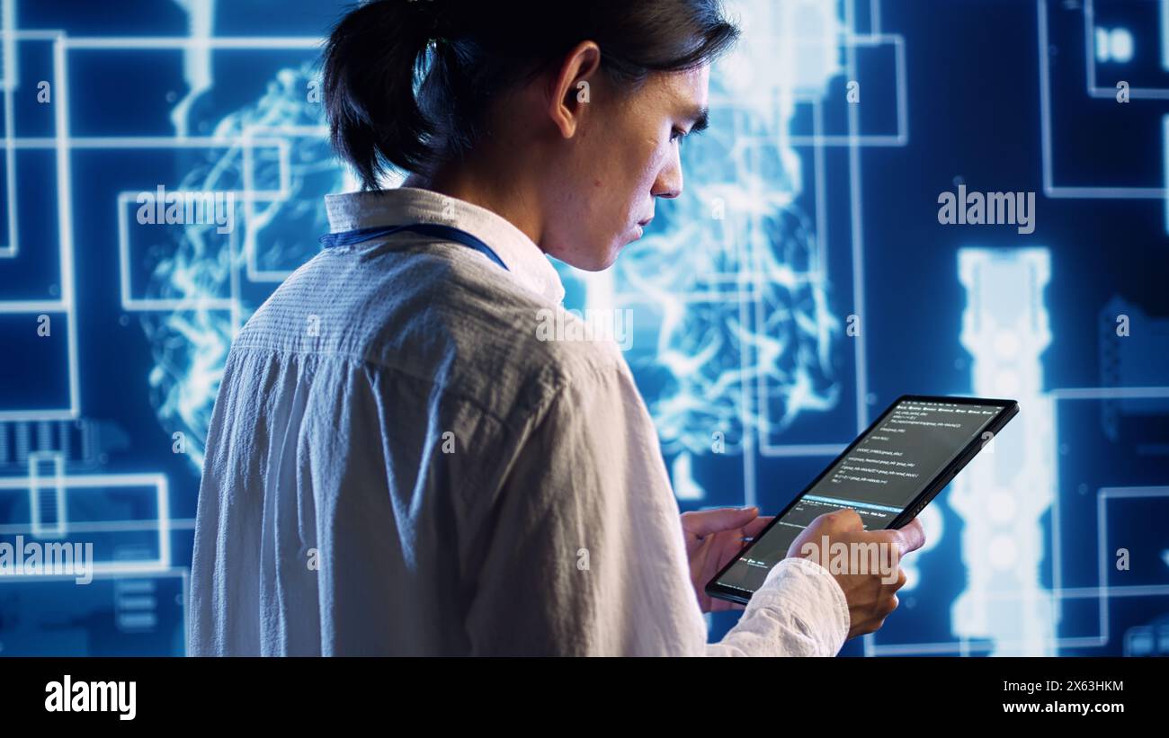 System administrator in data center running programming scripts on ... System administrator in data center running programming scripts on ...