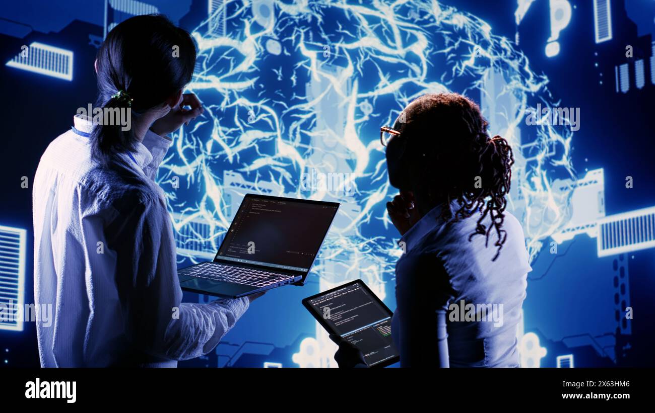 African american engineer and coworker develop artificial intelligence neural networks ...