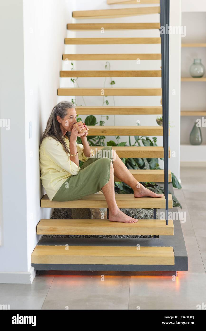 Lady stairs house hi-res stock photography and images - Alamy