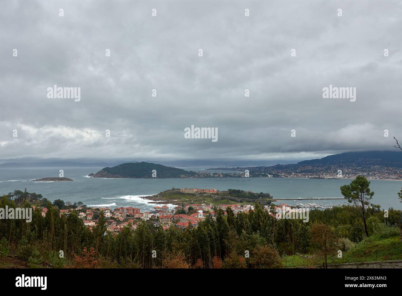 Panoramic view of the town of Baiona with the Parador in Monte Real ...