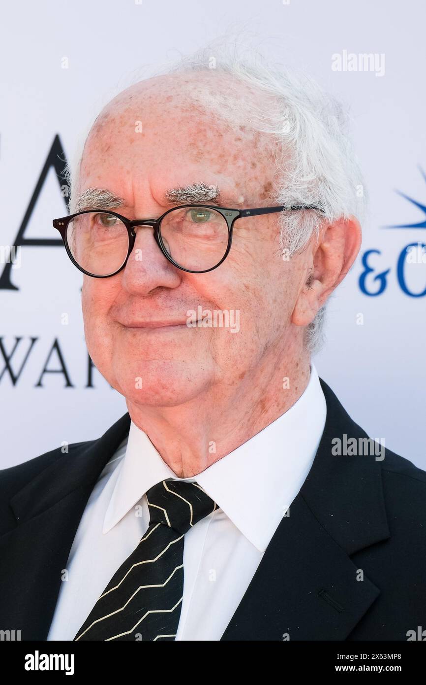 London, UK. 12th May, 2024. Jonathan Pryce photographed arriving at the ...
